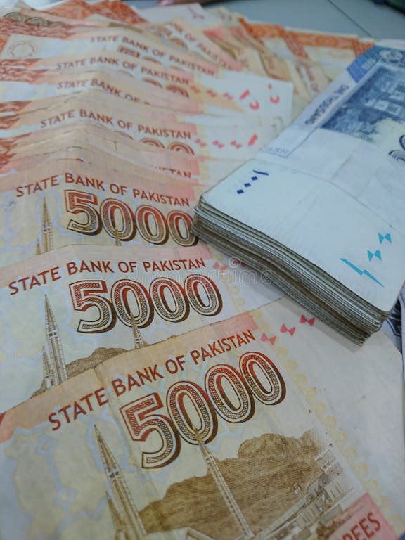 Pakistani Rupees Bank Notes 500,1000 and 5000 on the Table in the ...