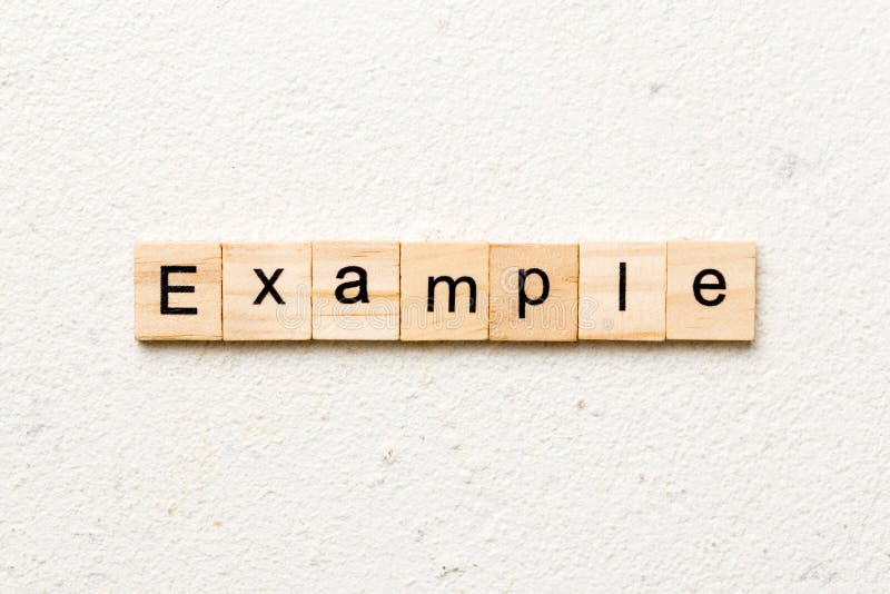 Palabra De Ejemplo Escrita En Bloque De Madera. Texto De Ejemplo En ...