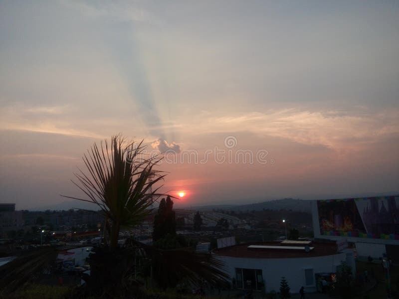 Pale sunset and city view stock photo. Image of sunset - 101736920