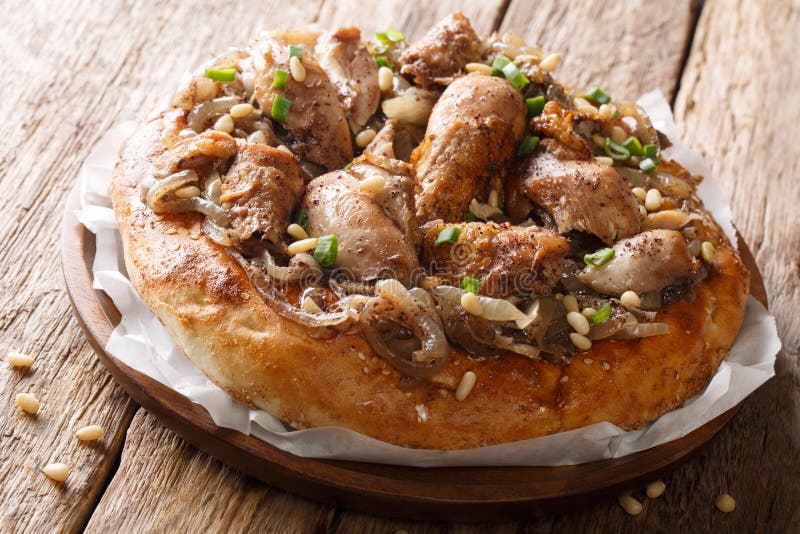 Palestinian Dish of Chicken with Sumac, Pine Nuts and Onions on a Flat ...