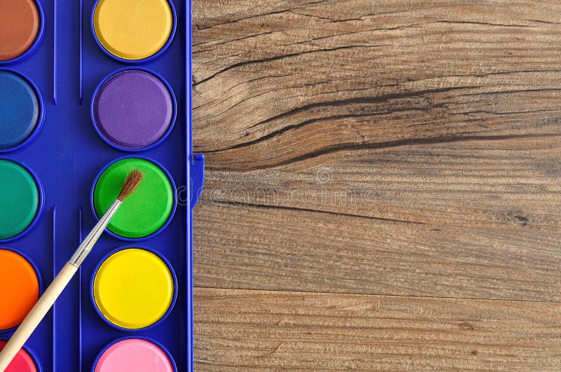 A pallet of colorful water paint, A pallet of colorful water paint in a ...