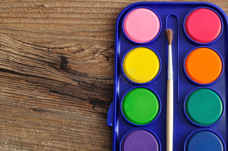 A Pallet of Colorful Water Paint in a Blue Plastic Container Stock ...