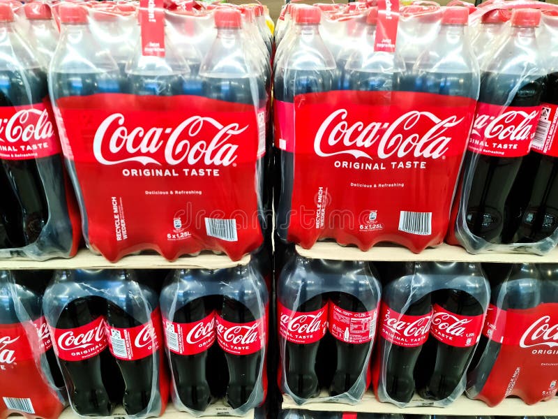A Pallet of Plastic Bottles of Coca Cola Brand Cola in a Supermarket ...