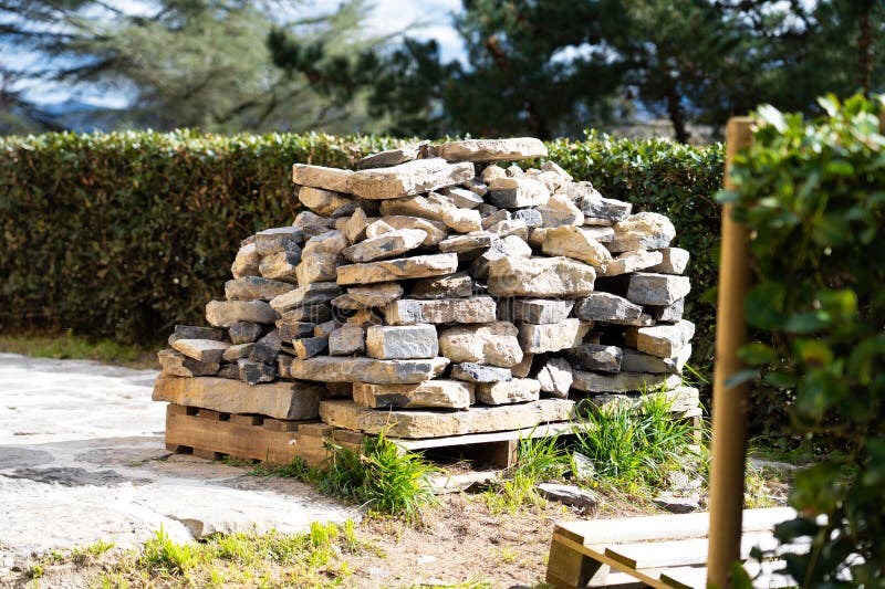 Pallet with Stacked Facing Stone on Countryside Stock Photo - Image of ...