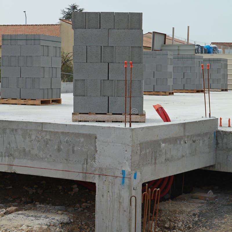 Pallets of Cinder Blocks on a Construction Site Stock Photo - Image of ...