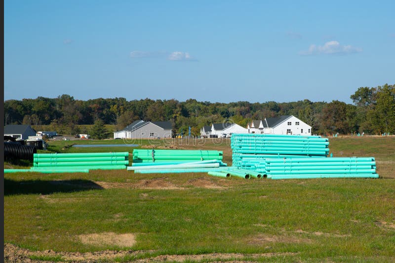 Pallets of Green Sewer Pipes at Construction Site Stock Image - Image ...