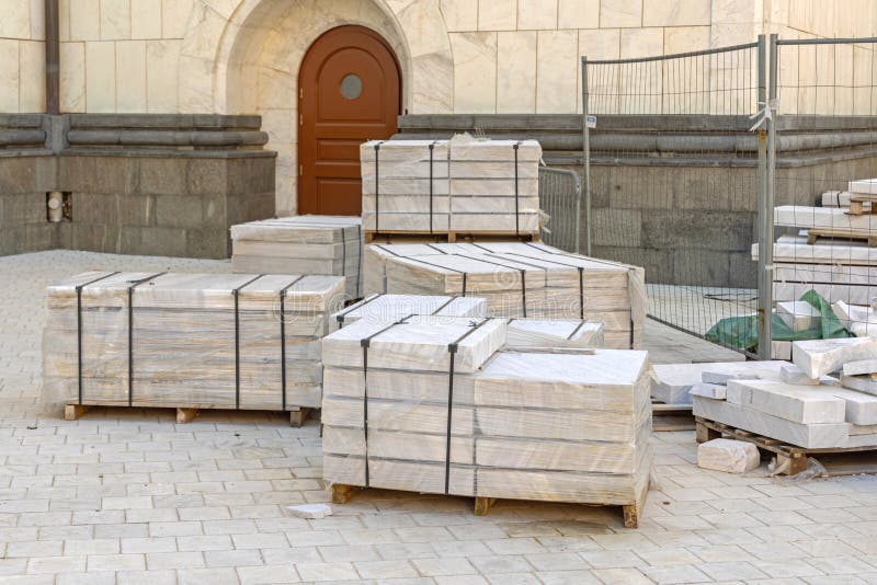 Pallets of Marble Tiles stock image. Image of heavy - 377507431