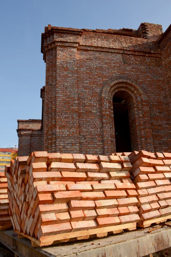 Pallets and Packages of Fresh Red Bricks at a Construction Site ...