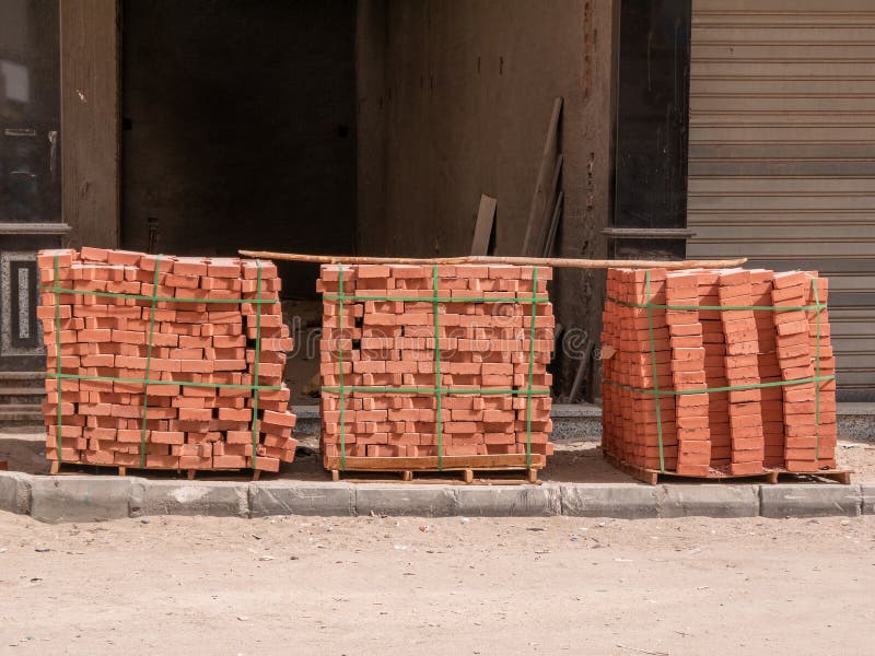 Pallets with Red Bricks Outdoors. Building Materials. Stock Image ...