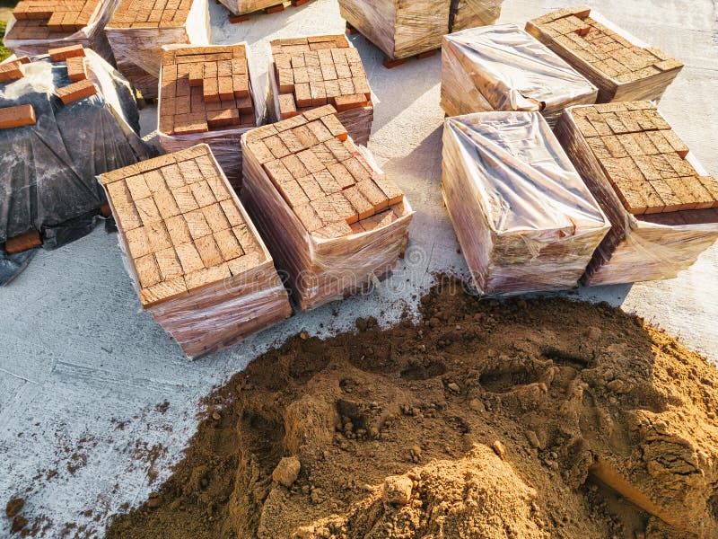 Pallets with Red Ceramic Bricks on the Roof of a Building Under ...
