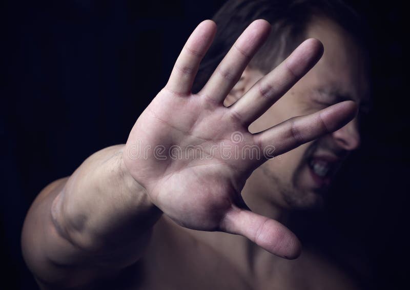 The Palm Stop Sign. the Young Guy Resists and Refuses Stock Photo ...