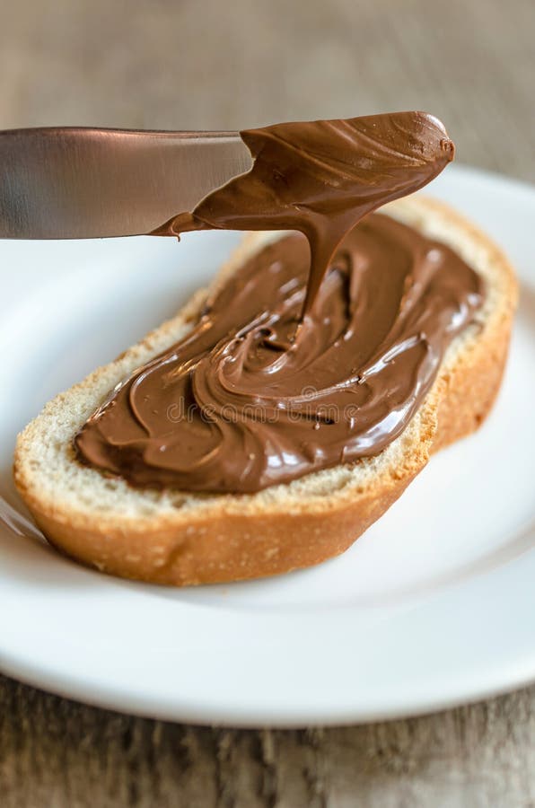 Pan Con Crema Del Chocolate Imagen de archivo - Imagen de alimento ...