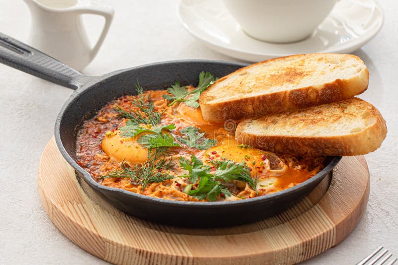 Pan of Shakshuka Middle Eastern Dish with Bread Stock Photo - Image of ...
