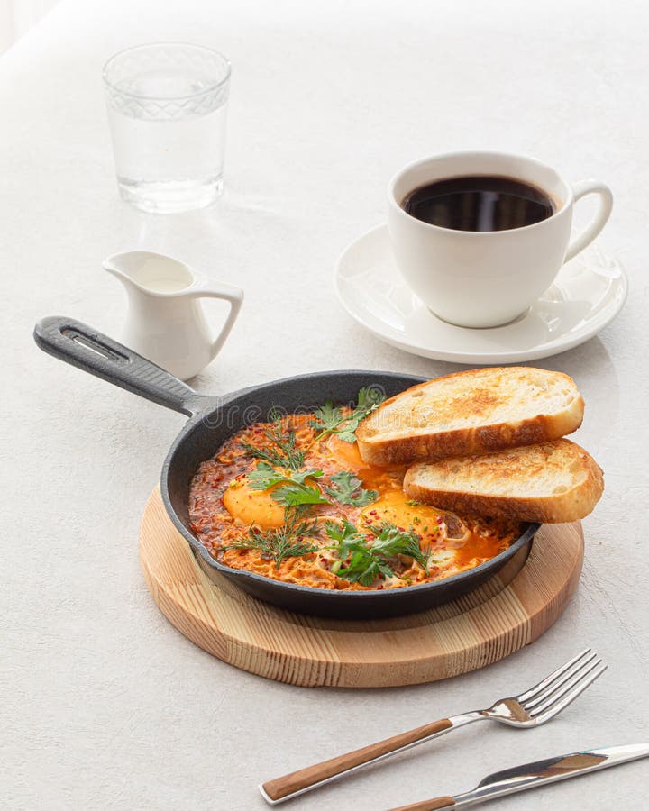 Pan of Shakshuka Middle Eastern Dish with Bread Stock Photo - Image of ...