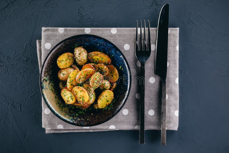Pan Fried Cherry Potatoes with Garlic and Onion Stock Image - Image of ...