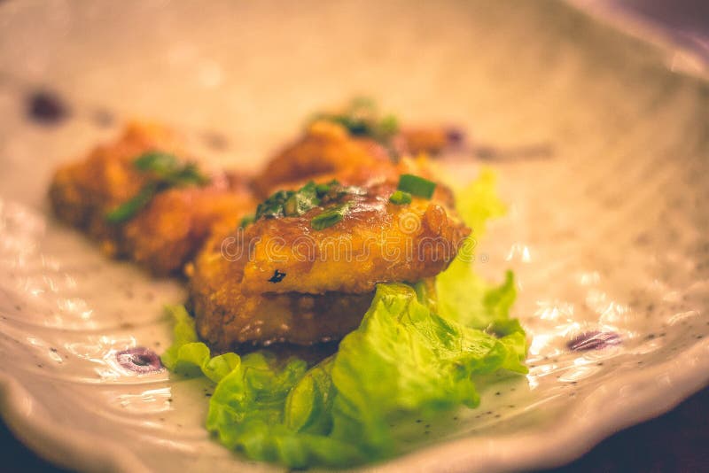 Pan Fried Cod Fish with a LETTUCE LEAF Stock Photo - Image of entree ...