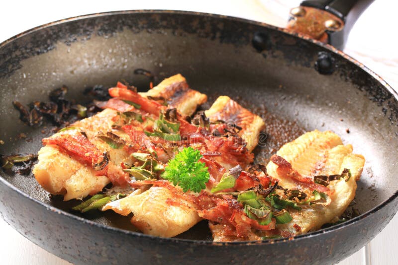 Pan fried fish fillets stock image. Image of bacon, food - 28907323