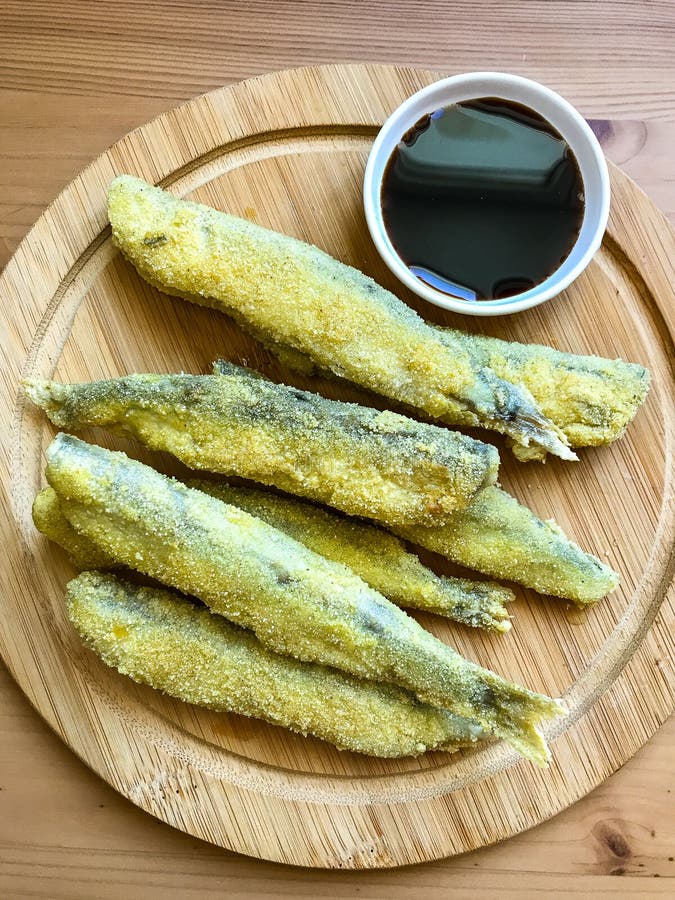 Pan Fried Fish on a Plate. Capelin Fried in Oil with Crispy Breading ...
