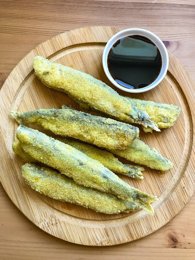 Pan Fried Fish on a Plate. Capelin Fried in Oil with Crispy Breading ...