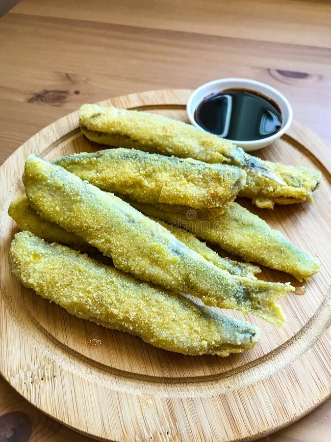 Pan Fried Fish on a Plate. Capelin Fried in Oil with Crispy Breading ...