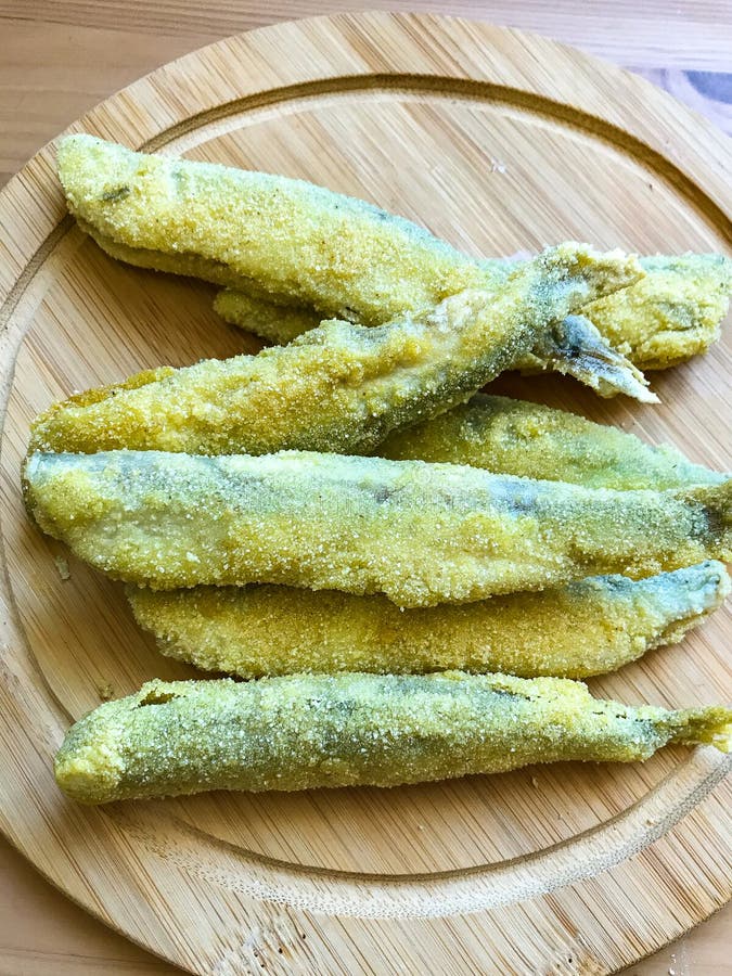 Pan Fried Fish on a Plate. Capelin Fried in Oil with Crispy Breading ...