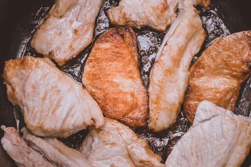 Pan fried meat top view stock image. Image of frying - 147144693