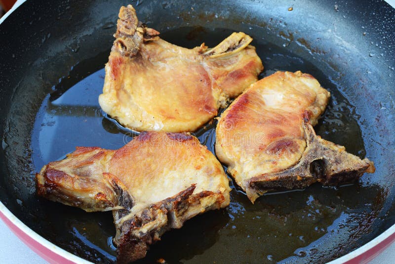 Pan Fried Pork Chops with Bone Stock Image - Image of meal, steak: 33014235