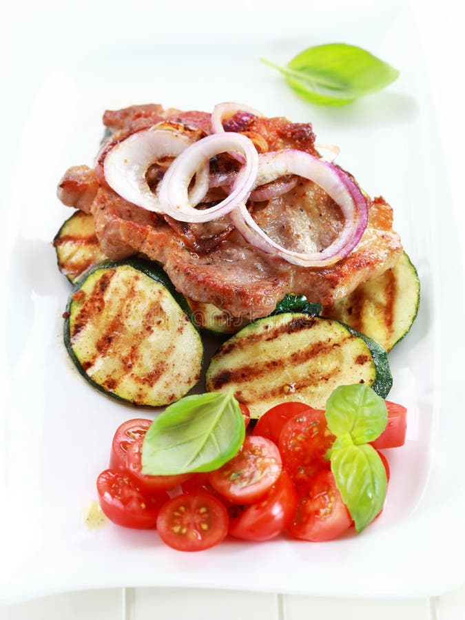 Pan-fried Pork Steak with Grilled Vegetable Stock Image - Image of ...