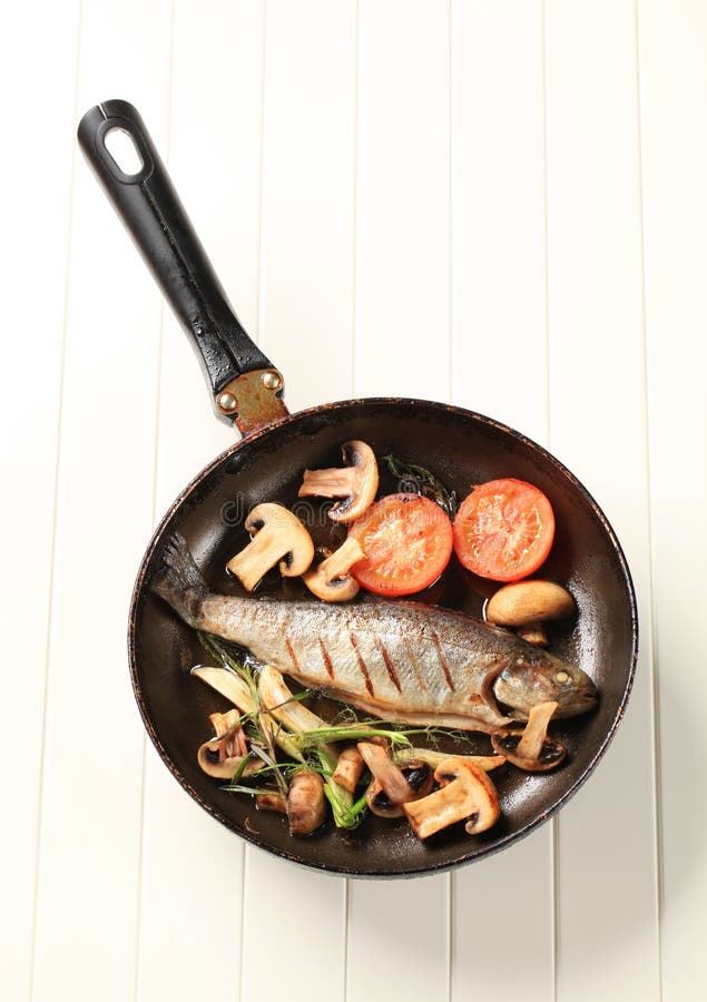Pan fried trout stock photo. Image of entree, skillet - 19577354