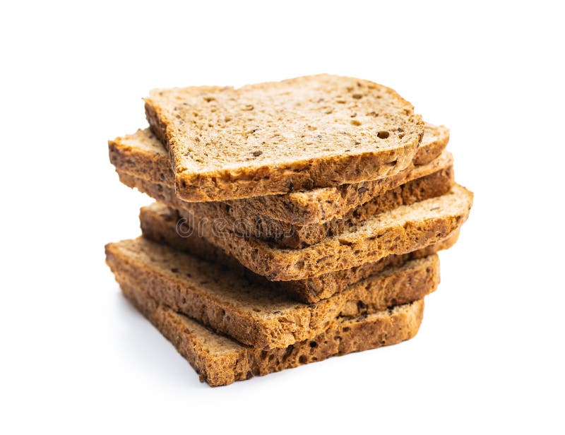 Pan Integral En Rodajas Sobre Mesa Blanca Imagen de archivo - Imagen de ...
