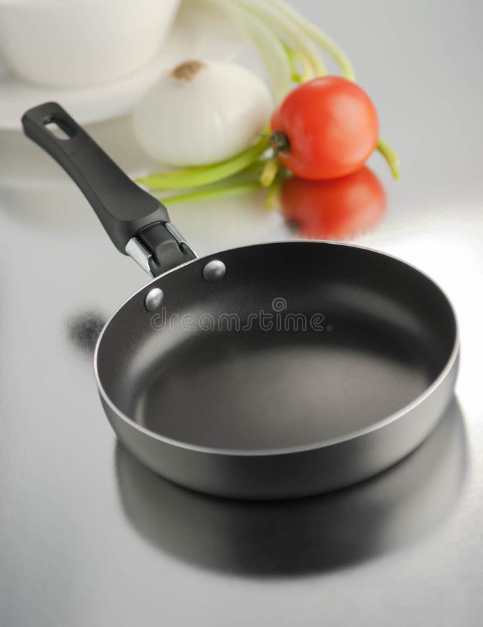 Pan on kitchen counter top stock image. Image of food - 25279259