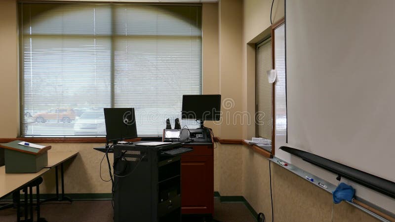 Pan Left of Classroom Computers and Technology in Front of Room Stock ...