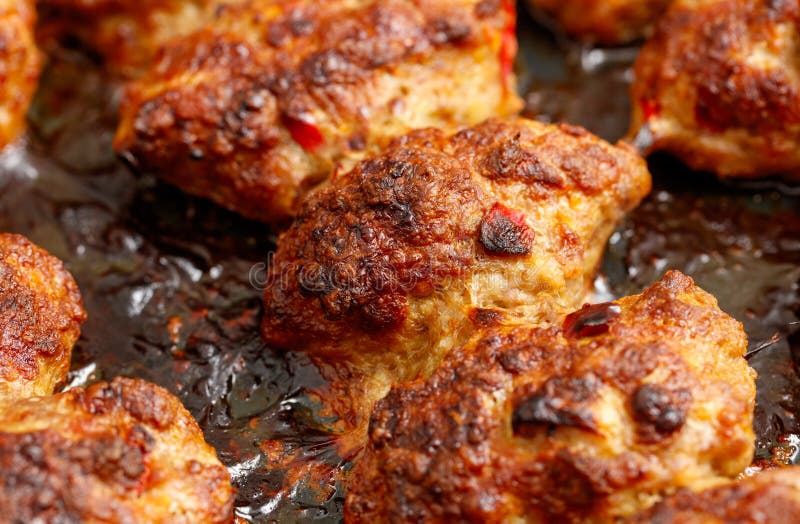 A Pan of Meat is Cooked and Has a Burnt Crust Stock Image - Image of ...