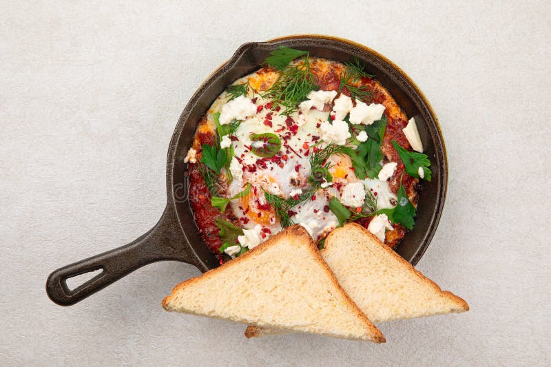 Pan of Middle Eastern Dish Shakshuka with Toasts Stock Photo - Image of ...