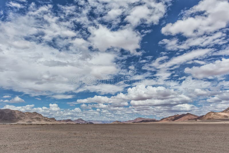 Pan of the Namibia Desert with Mountains and Cloudy Sky. Stock Image ...
