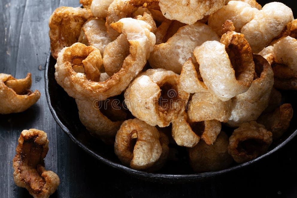 Pan of pork rinds stock image. Image of horizontal, cholesterol - 372376781