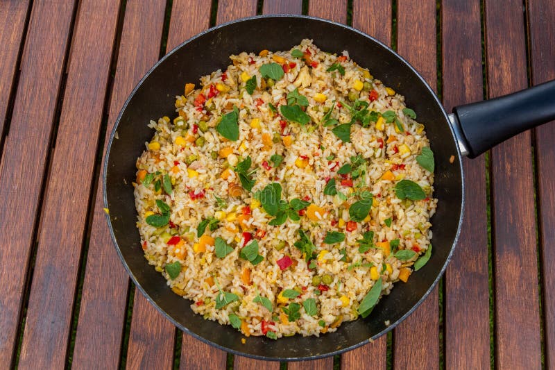 Pan of rice with vegetabl stock photo. Image of dish - 290604442