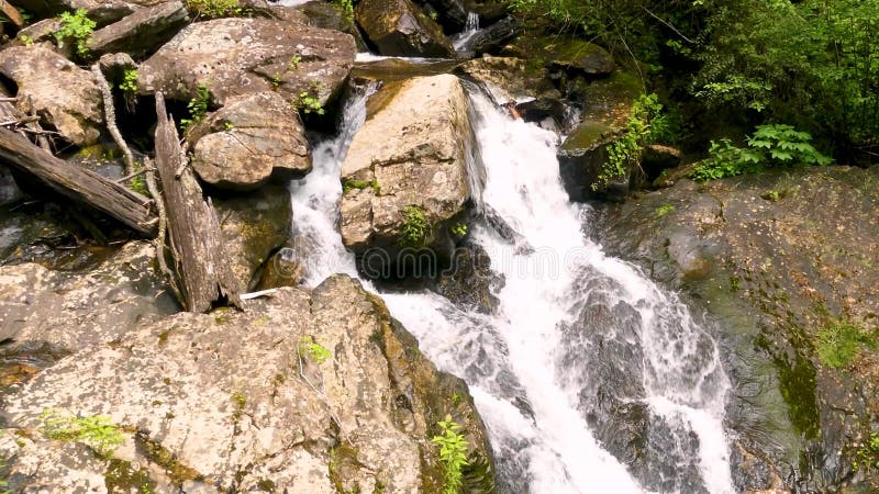 Georgia Anna Ruby Falls a Pan Right and a Tilt Down on a Small Water ...