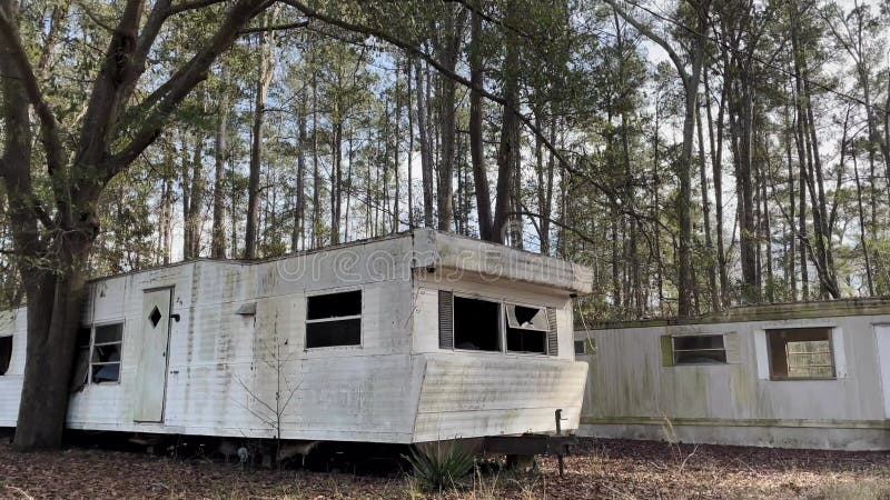 Pan of Run Down Trailers in a Trailer Park on Durano Park Trail Busted ...
