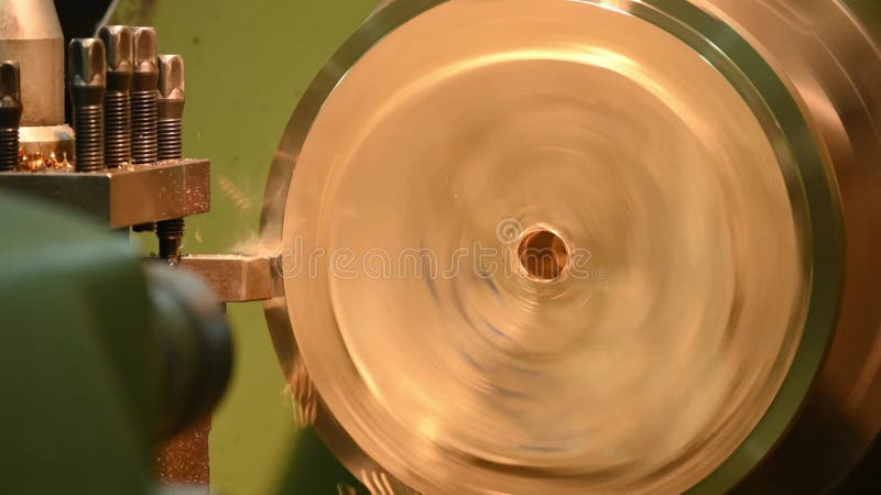 Pan Scene of the Lathe Machine Rough Cutting the Brass Disk Parts by ...