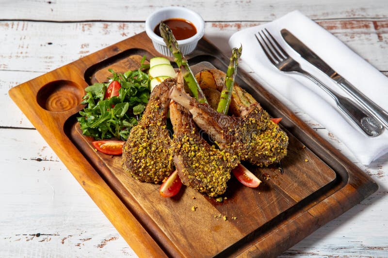 Pan seared lamb racks stock image. Image of ribeye, fruits - 322664765