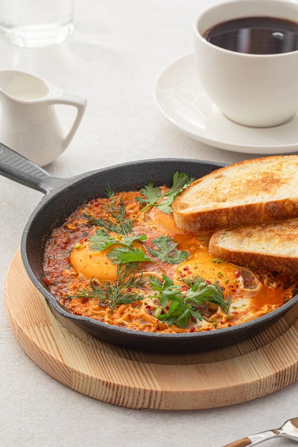 Pan of Shakshuka Middle Eastern Dish with Bread Stock Photo - Image of ...