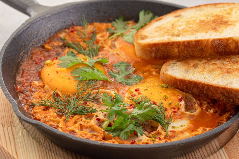 Pan of Shakshuka Middle Eastern Dish with Bread Stock Image - Image of ...