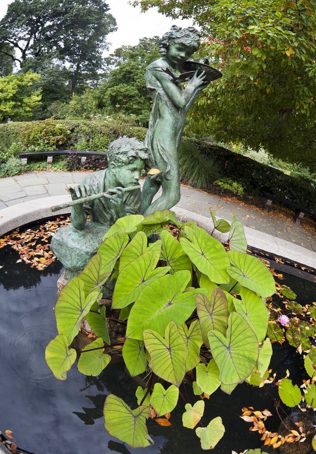 Pan statue stock photo. Image of central, flower, water - 17887674
