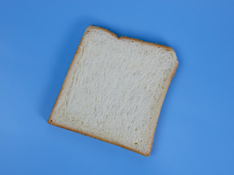 Pan Tostado Con Fondo Azul Pastel Imagen de archivo - Imagen de pedazo ...