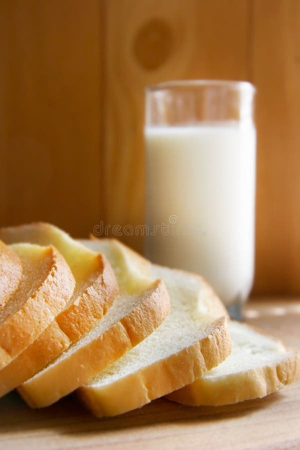 Pan y leche foto de archivo. Imagen de cocinero, coma - 9196302