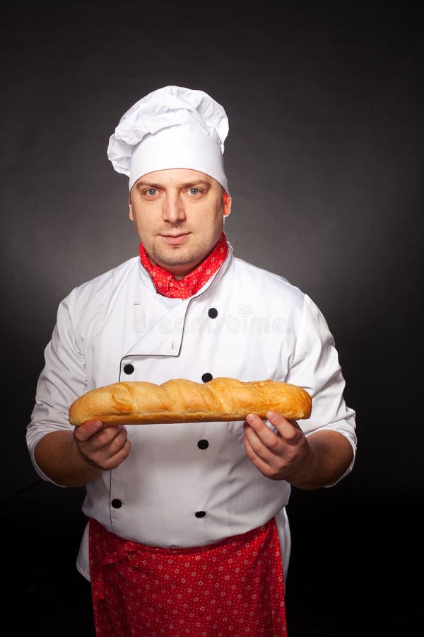 Panadero con pan imagen de archivo. Imagen de panadero - 30750311