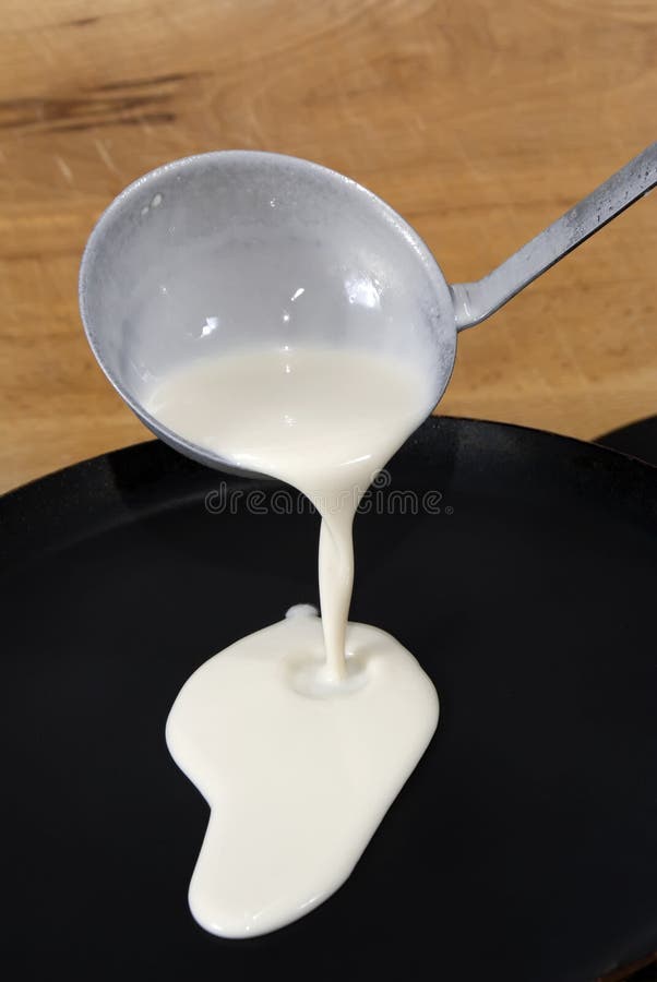Pancake Batter is Poured into the Pan Stock Photo - Image of batter ...