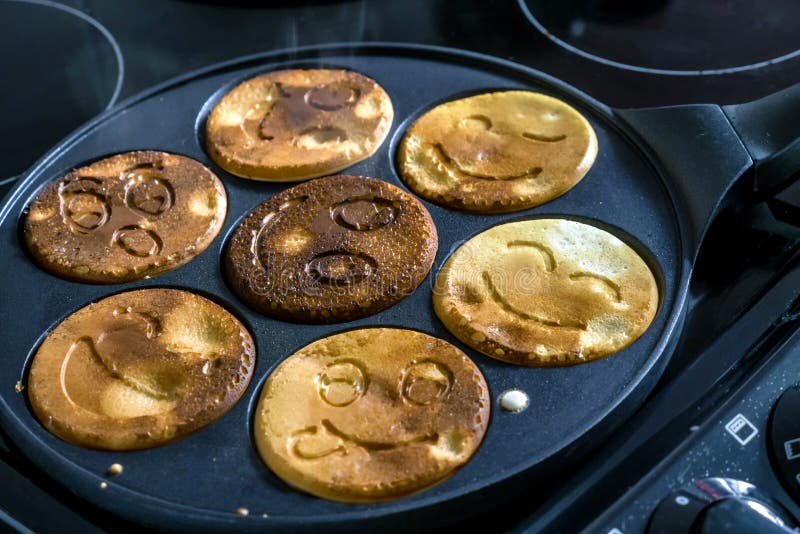 Pancake Frying Pan with Smile Face Pancake Cooking on Cooker in Kitchen ...