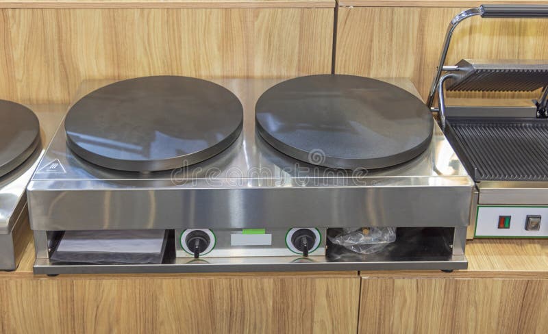 Pancake Machine Hot Plates stock image. Image of kitchen - 277729619